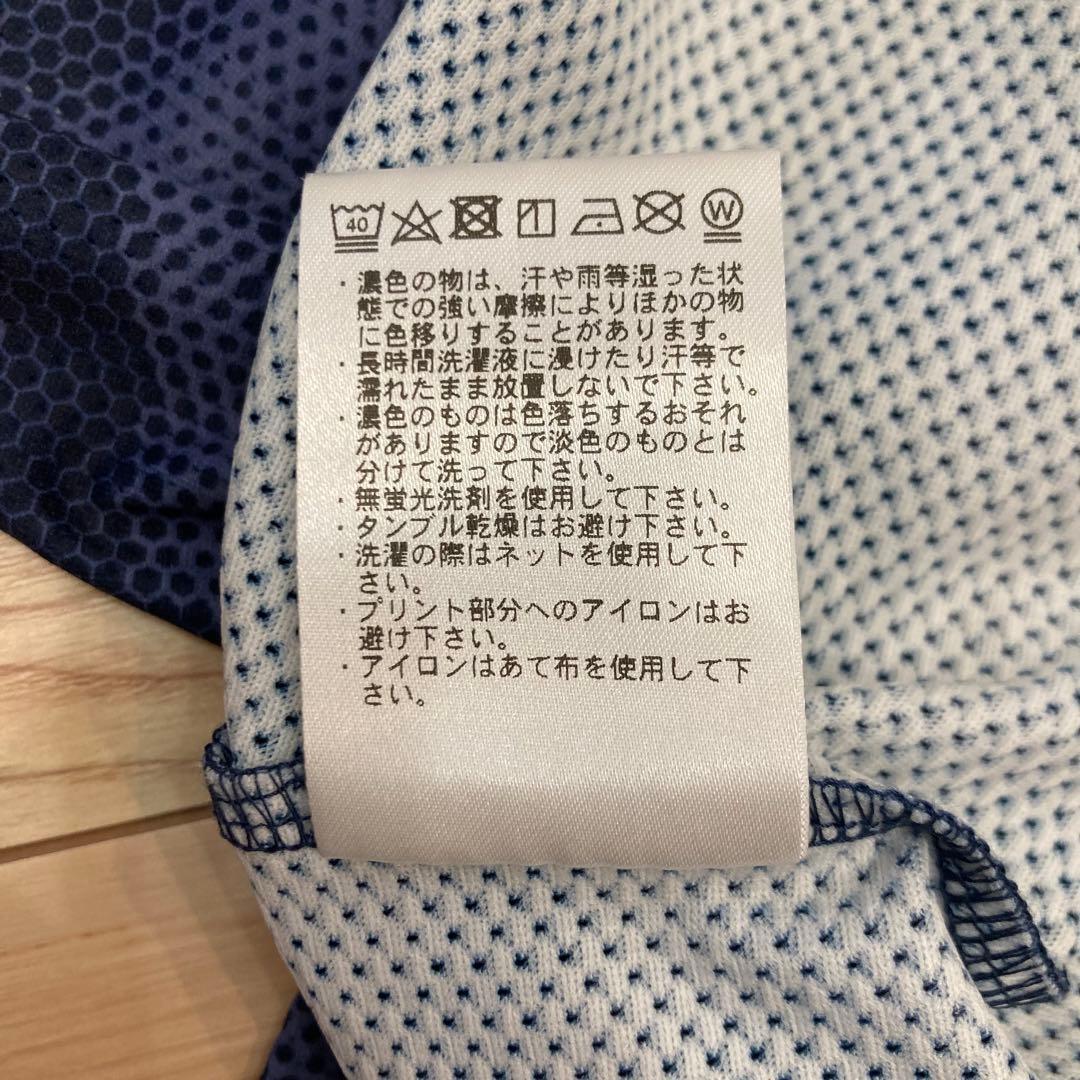ゴ*ン様 BRIEFING ポロシャツ メンズ カモフラ柄 企業ロゴ入