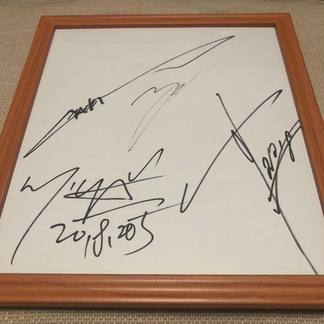 S.K.I.N. 貴重なフルメンバーサイン色紙