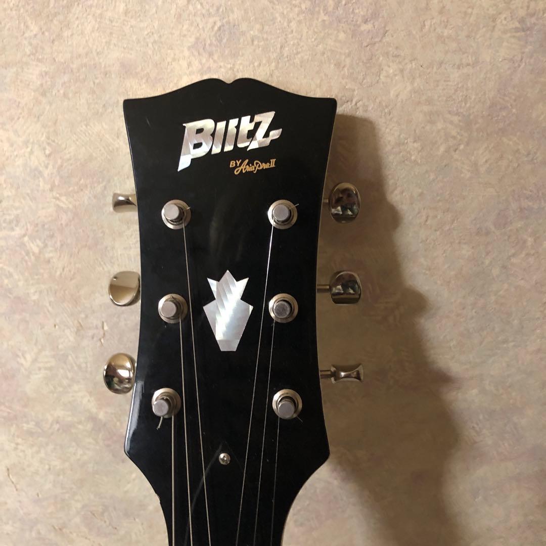 Blitz by Aria Pro Ⅱ SGステッカー付きホワイトエレキギター