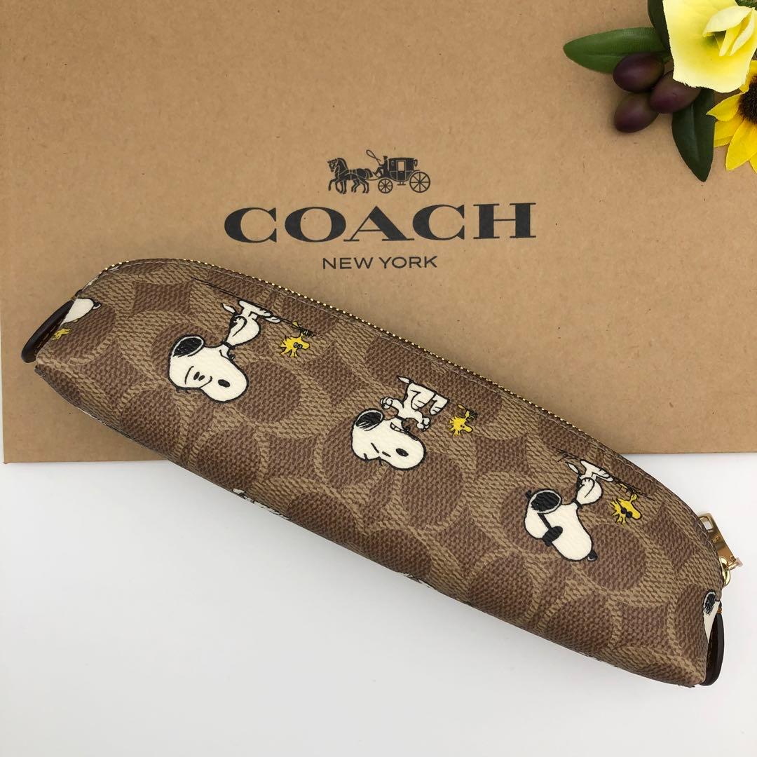 COACHxPEANUTSコラボ ★大人気★ ペンシルケース スヌーピー 新品