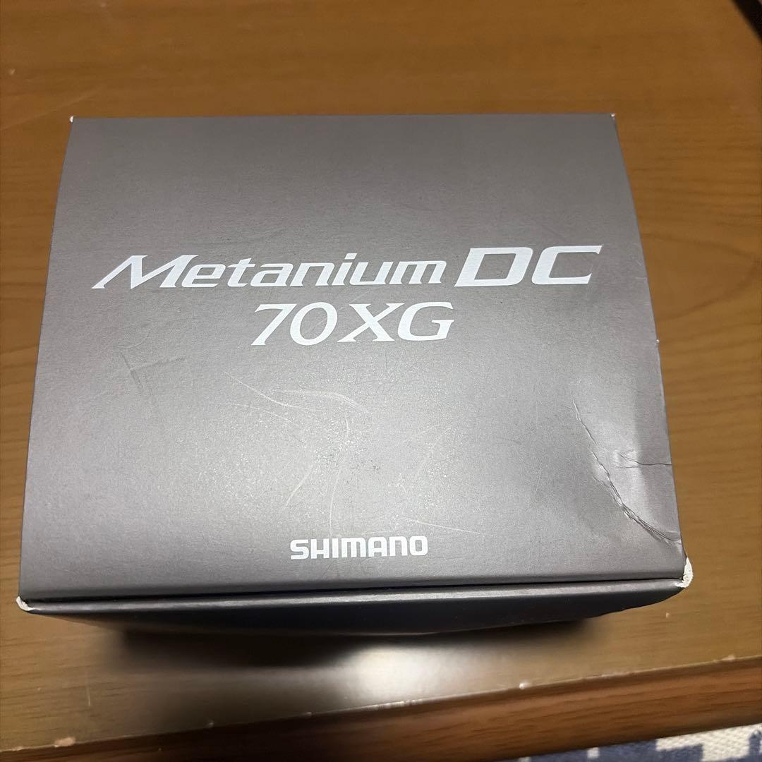 SHIMANO nium DC 70XG メタニウムDC (左)